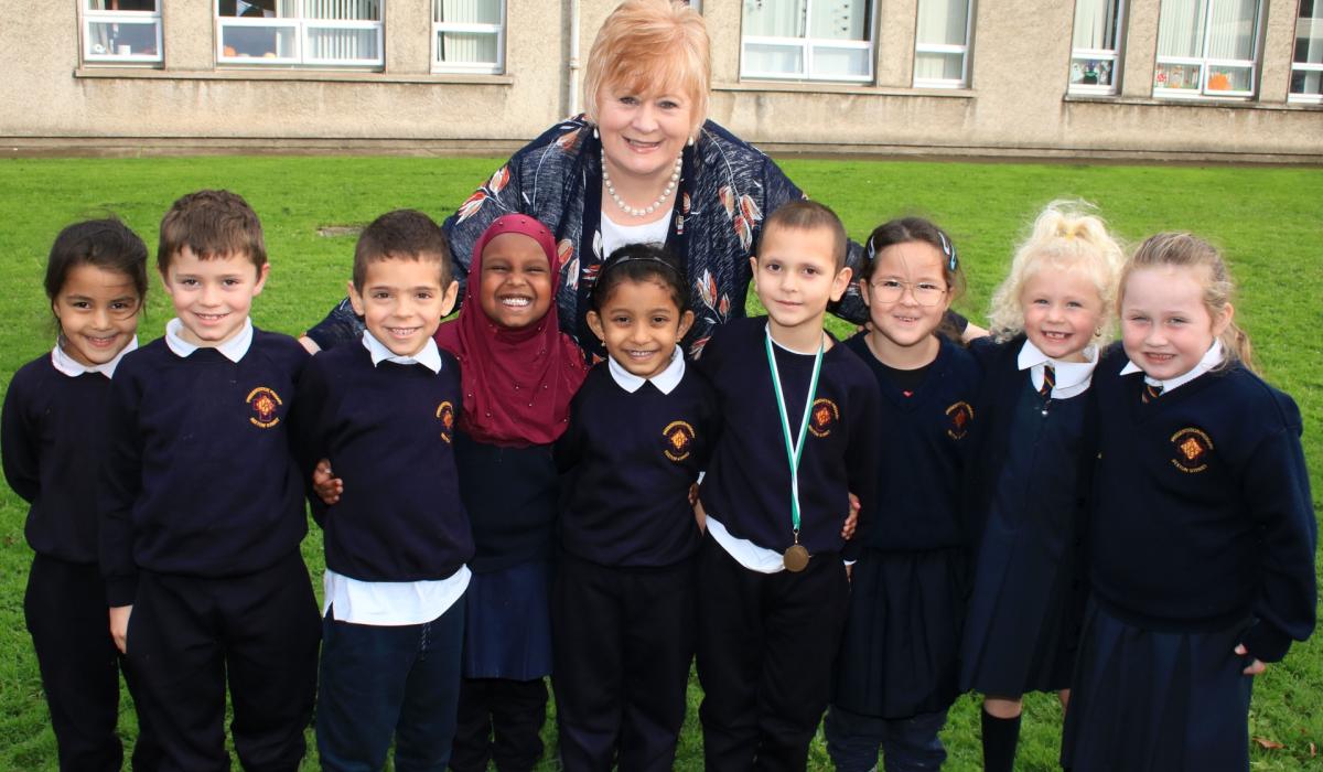 Emotions run high as Limerick school secretary retires following ...