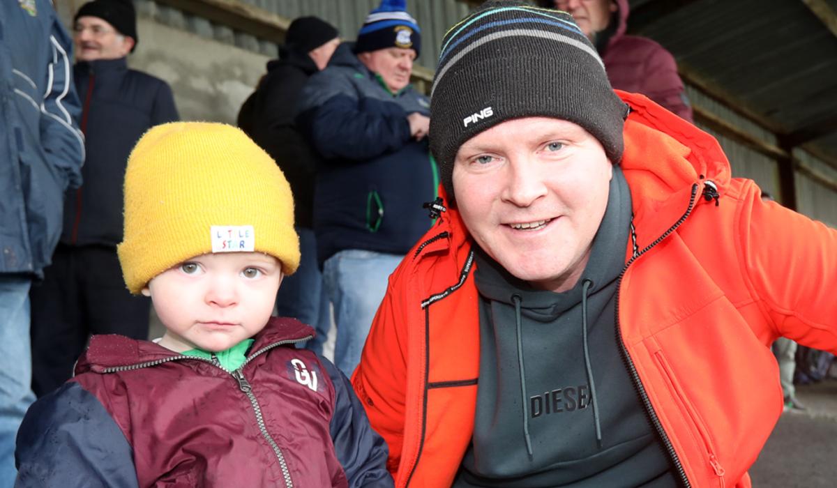 Supporters brave the elements to watch Limerick and Clare in football ...