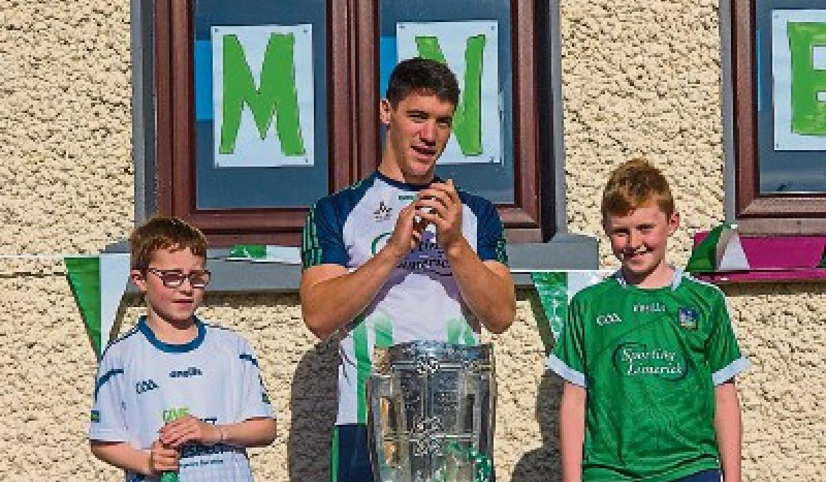 Limerick’s Sean Finn gets his hands on hurley from 1973 on school visit ...