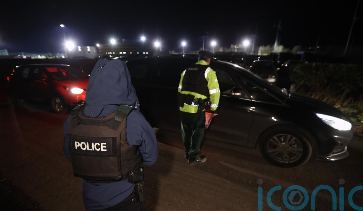 Police given more time to question two men over detective’s shooting in ...