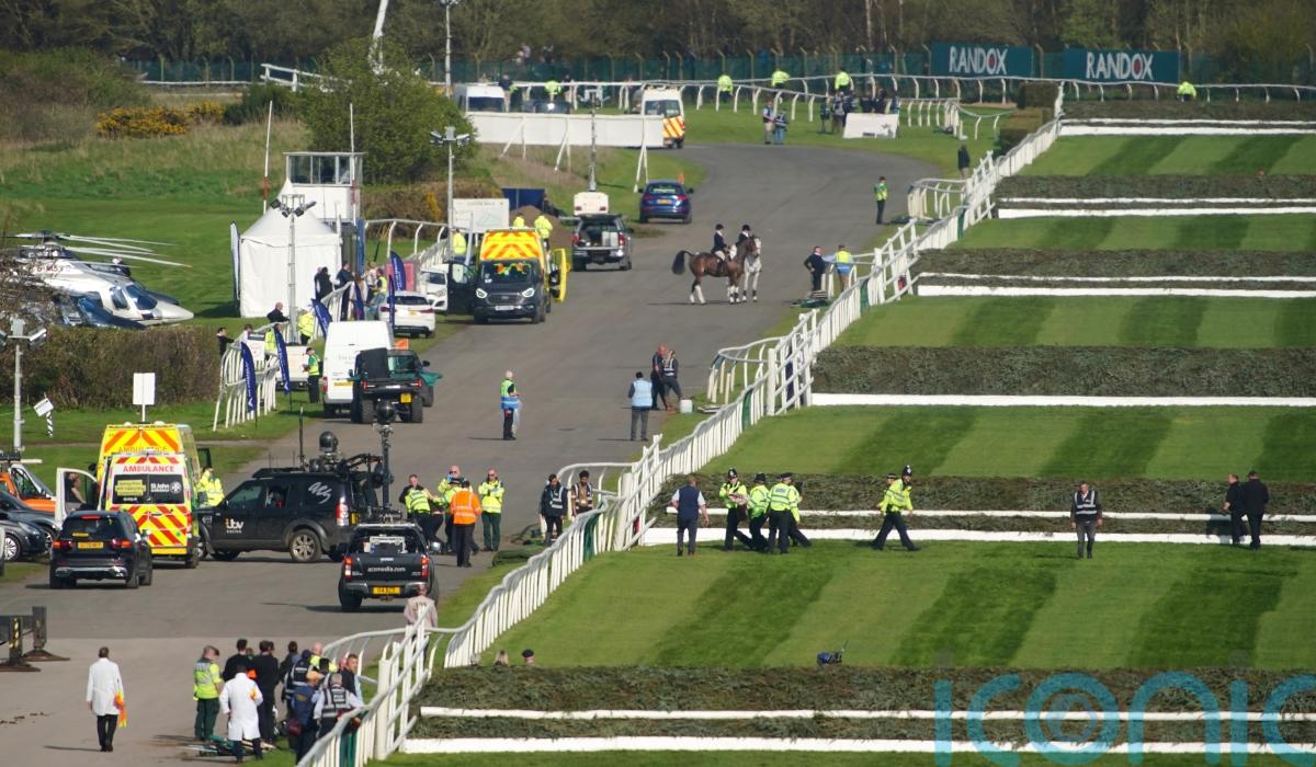 Multiple arrests as protestors storm track and delay start of Grand ...