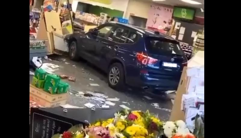 BREAKING: Car ends up on shop floor after smashing through store front ...