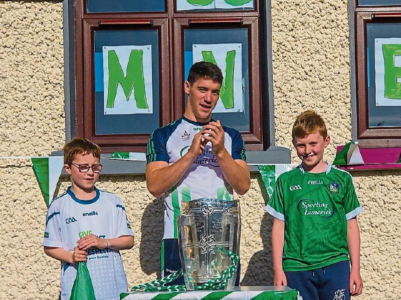 Limerick’s Sean Finn gets his hands on hurley from 1973 on school visit ...